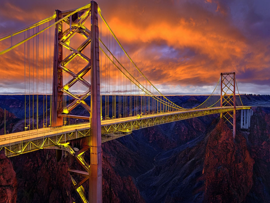 Create a 2D image of a dramatic suspension bridge spanning a... by ...