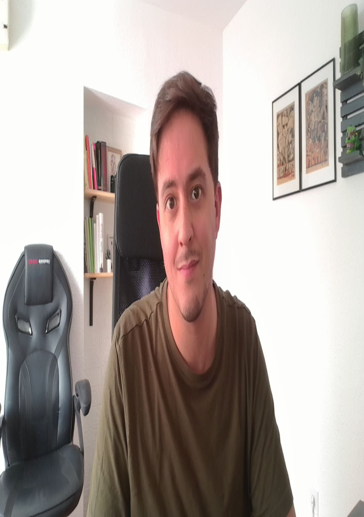 Developer in a modern office setting by Juan Carlos Ibáñez - Playground